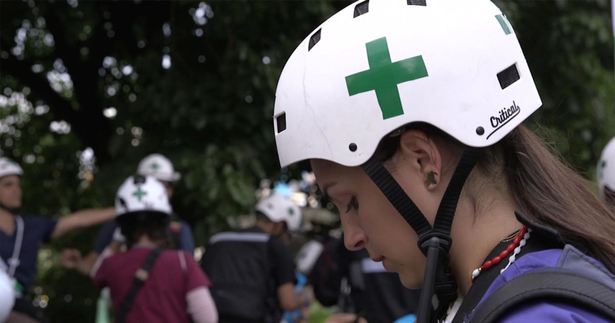 'Green Helmets’ Risk Their Lives To Protect Venezuelan Protesters