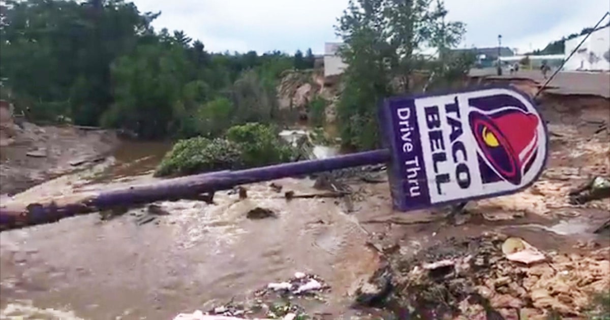 Michigan flash floods leave massive sinkholes, washed-out roads