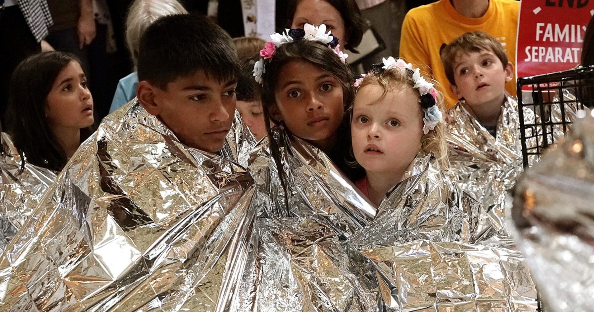 Children wearing Mylar blankets protest to reunite migrant children ...
