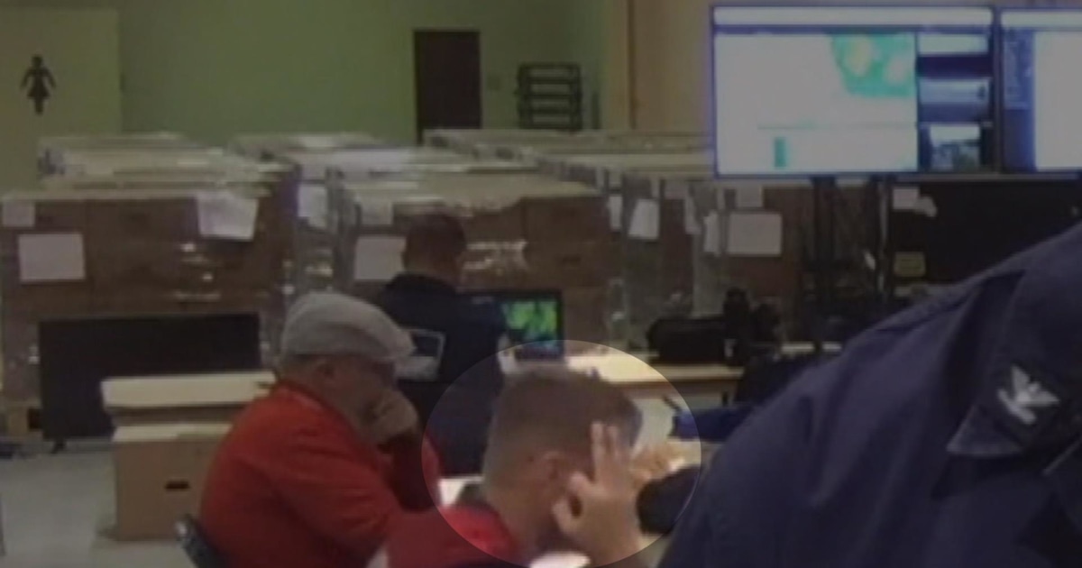 U.S. Coast Guard member appears to flash 'white power' hand signal on air