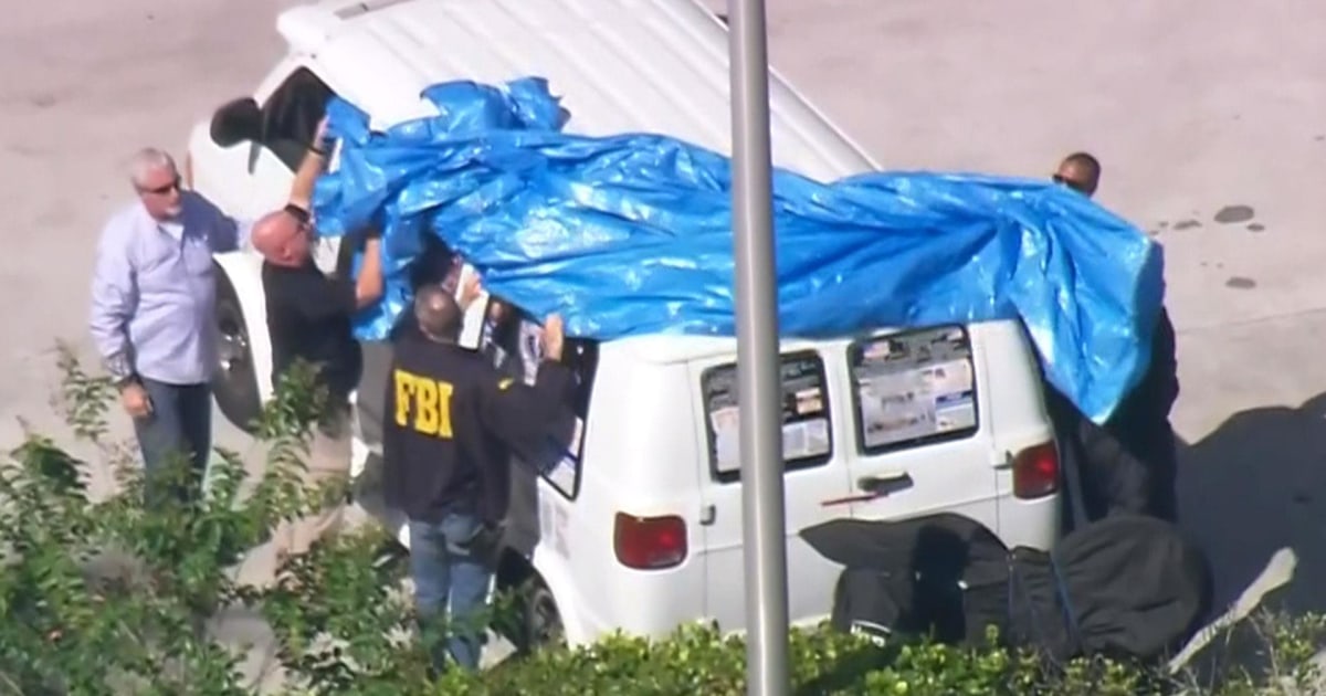 Bomb suspect's van, covered in pro-Trump stickers, towed away by police