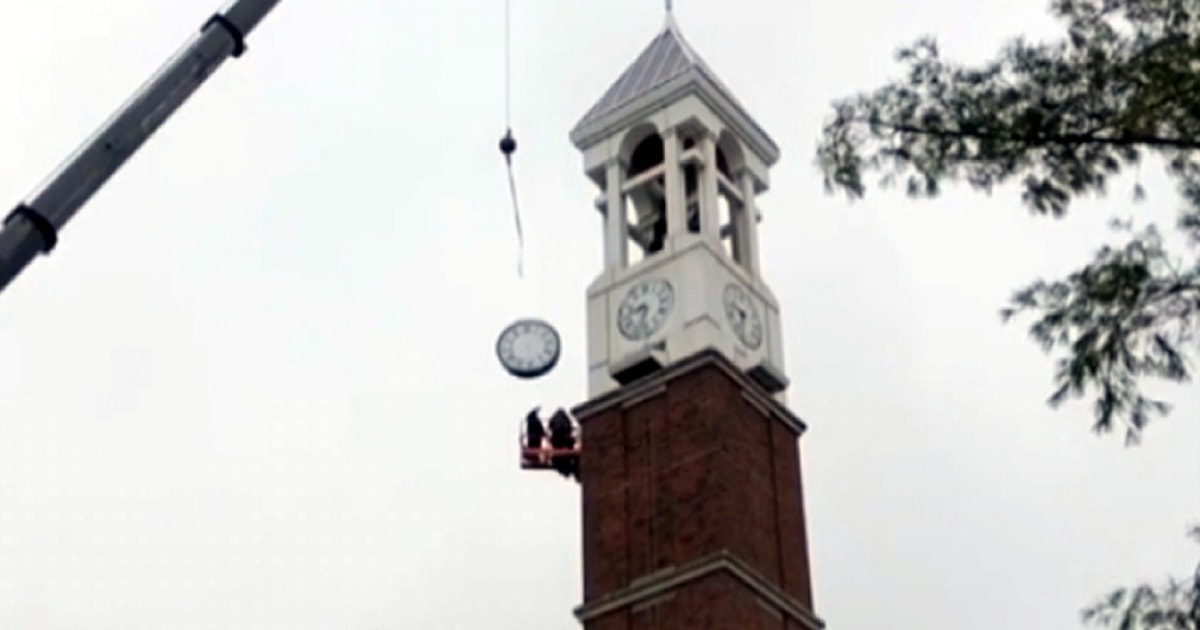 Watch giant clock come crashing as crew attempts bell tower installation