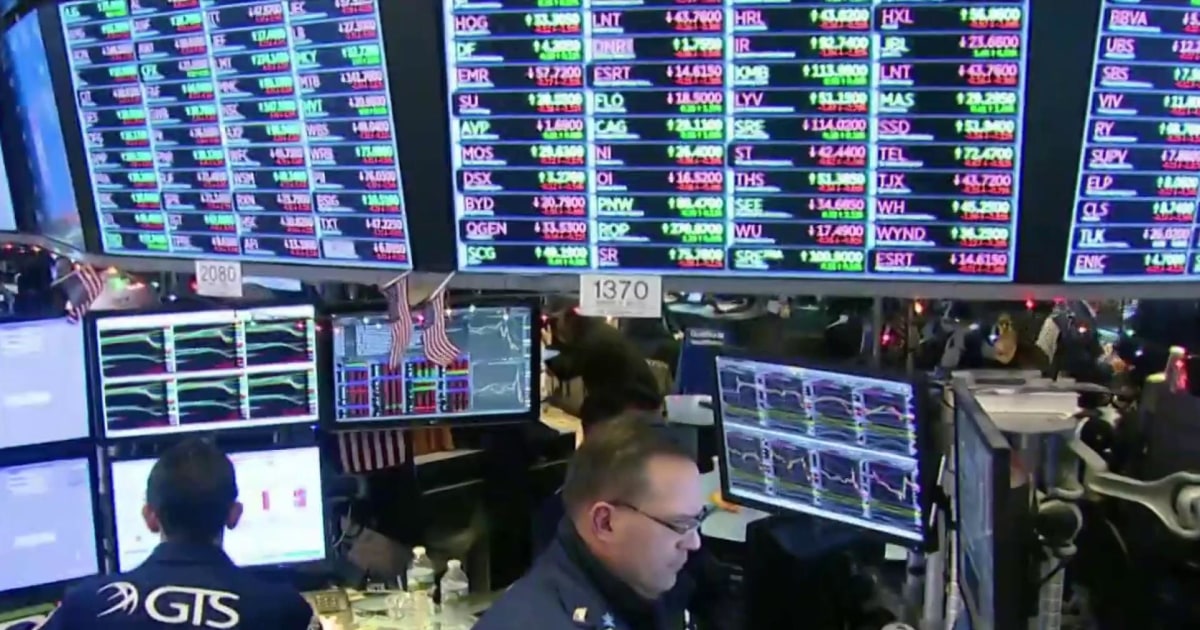 Dow loses 352 points after Federal Reserve raises interest rates for ...