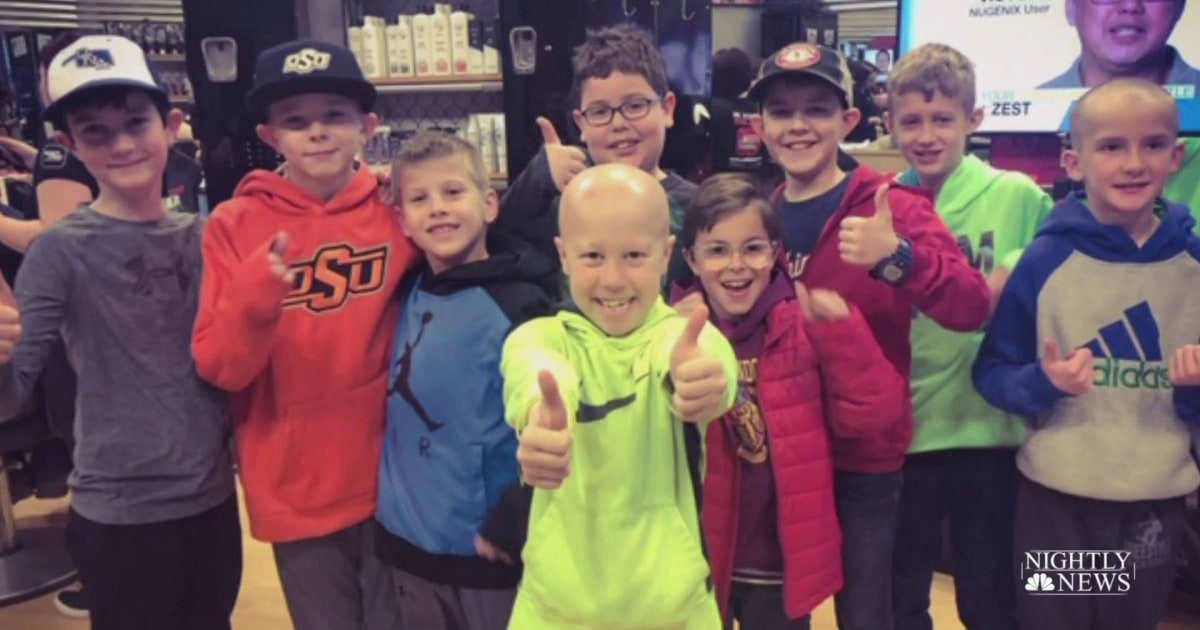 Third graders shave their heads to support their friend with alopecia