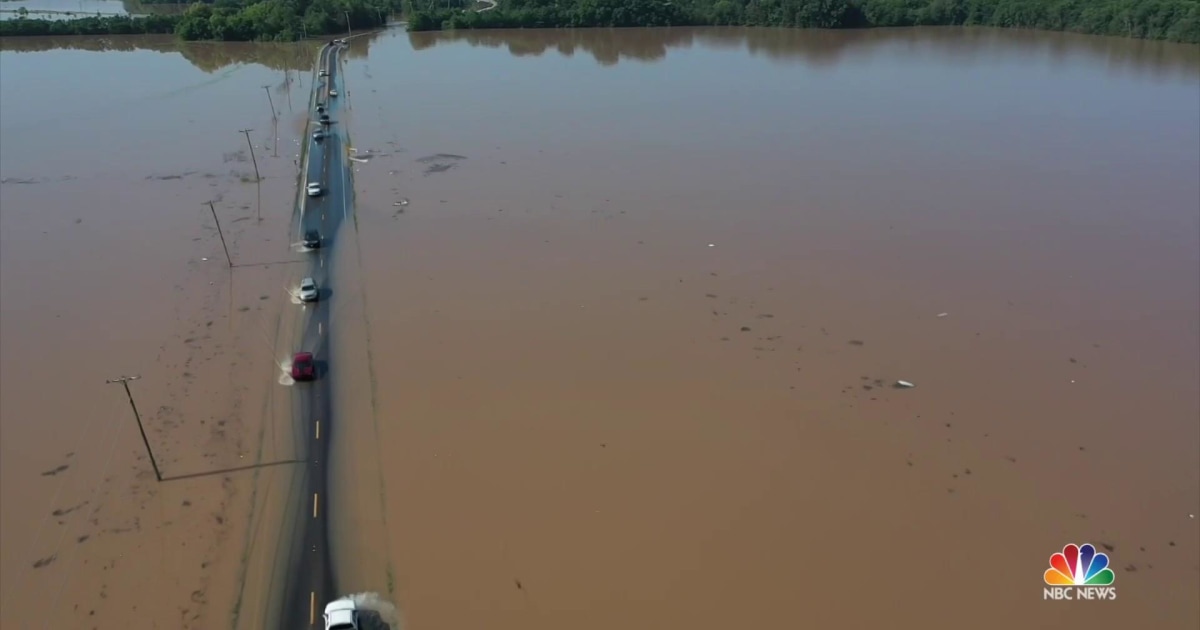 Flood emergency as rivers rise to historic levels, putting communities ...