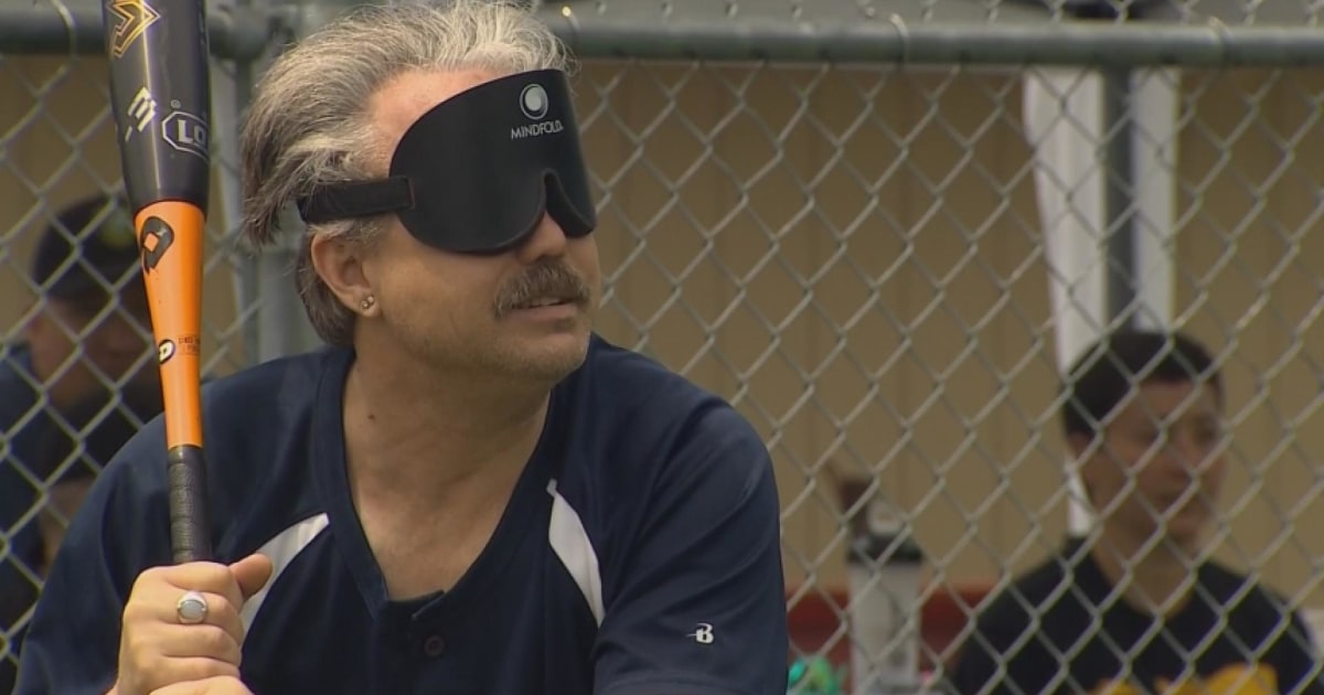 Beeping baseball gives blind a chance to take the field