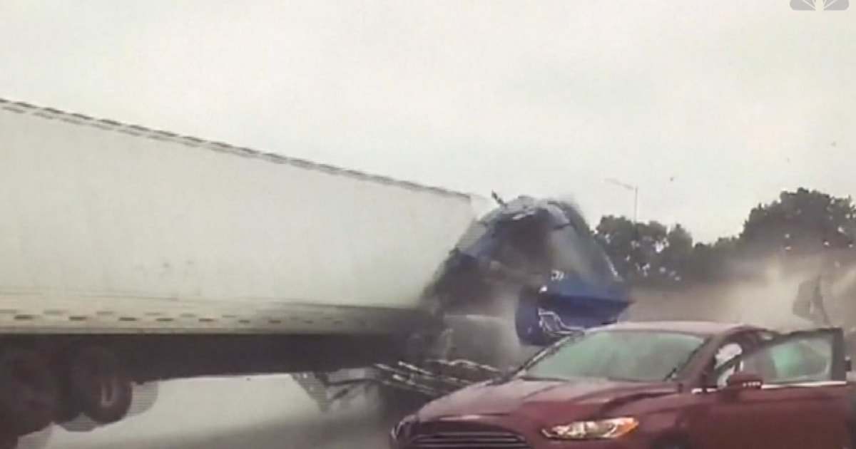 Semi-truck crashes into tow truck, rolls over Wisconsin highway