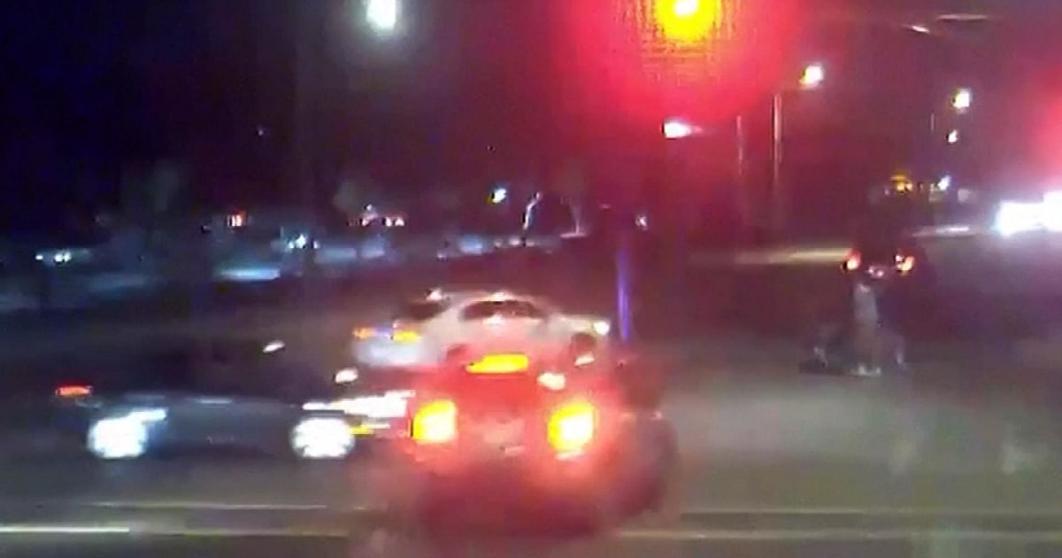 Caught on camera: Car almost hits couple after running red light at ...