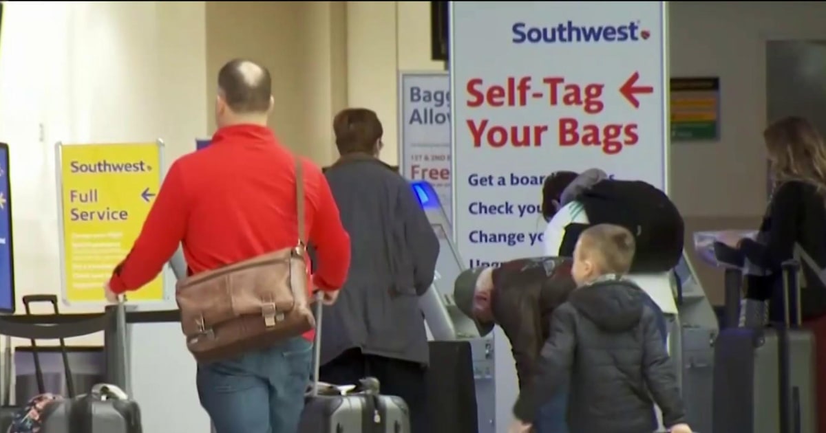 Airport misery as severe weather causes delays, cancellations across ...