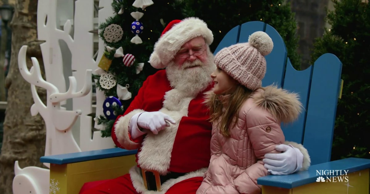 Children and Santa Claus reflect on the meaning of Christmas