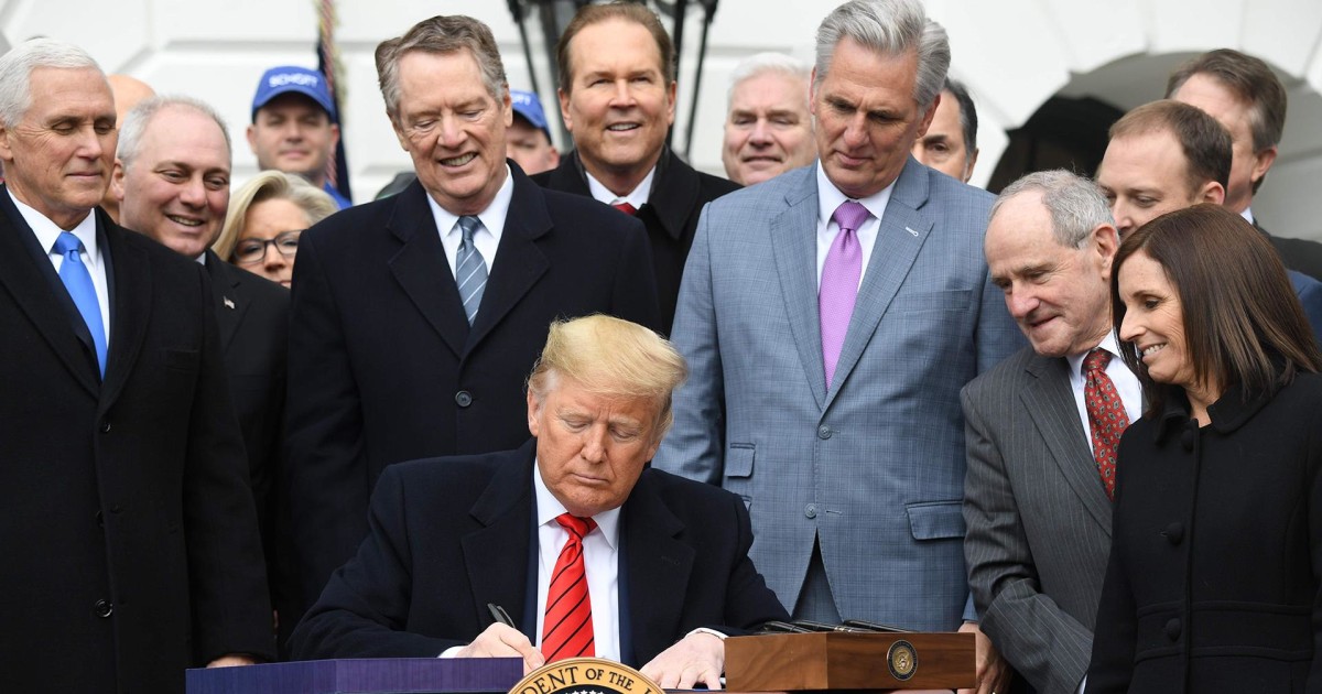 Trump signs USMCA trade deal into law to replace NAFTA