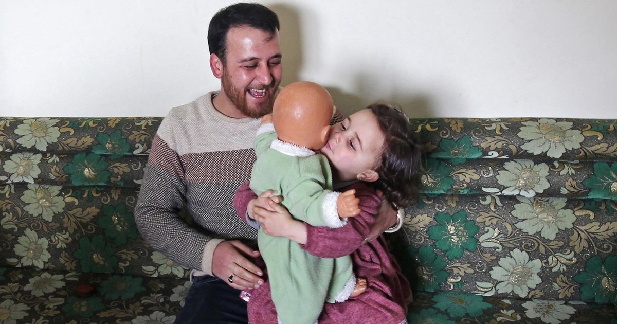 Watch: Syrian father encourages daughter to laugh as bombs fall