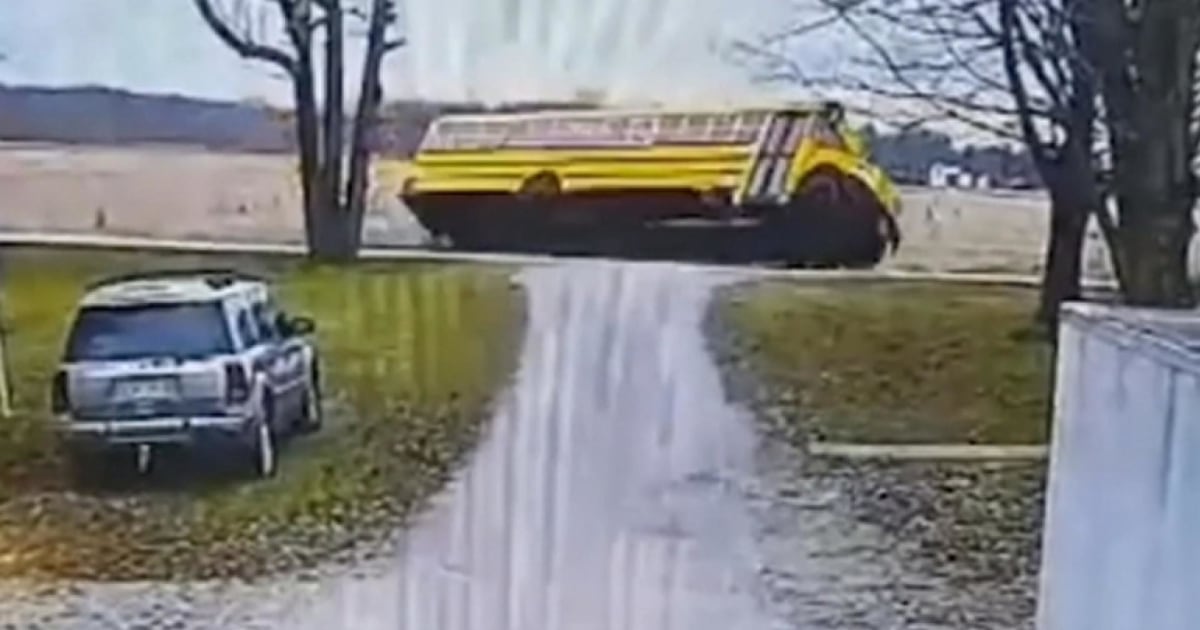 Ohio school bus flips on its side, two students injured