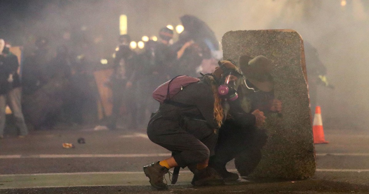 Tear gas, flash-bangs and fireworks thrown on another violent night in ...