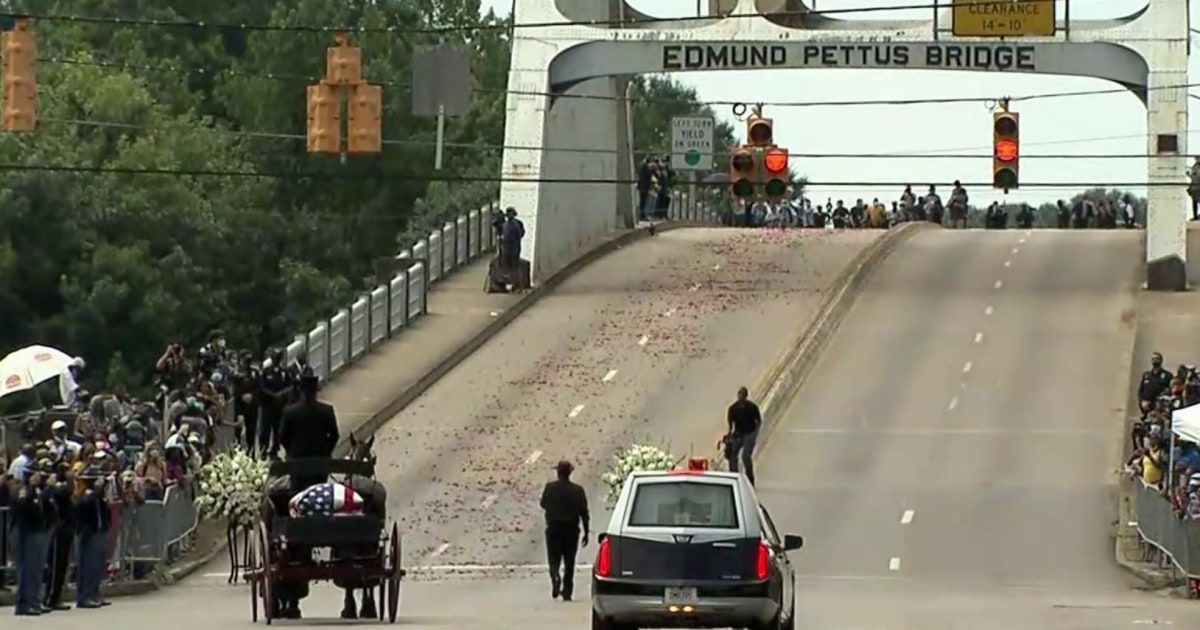 Rep. John Lewis' body travels across the historic Edmund Pettus Bridge ...
