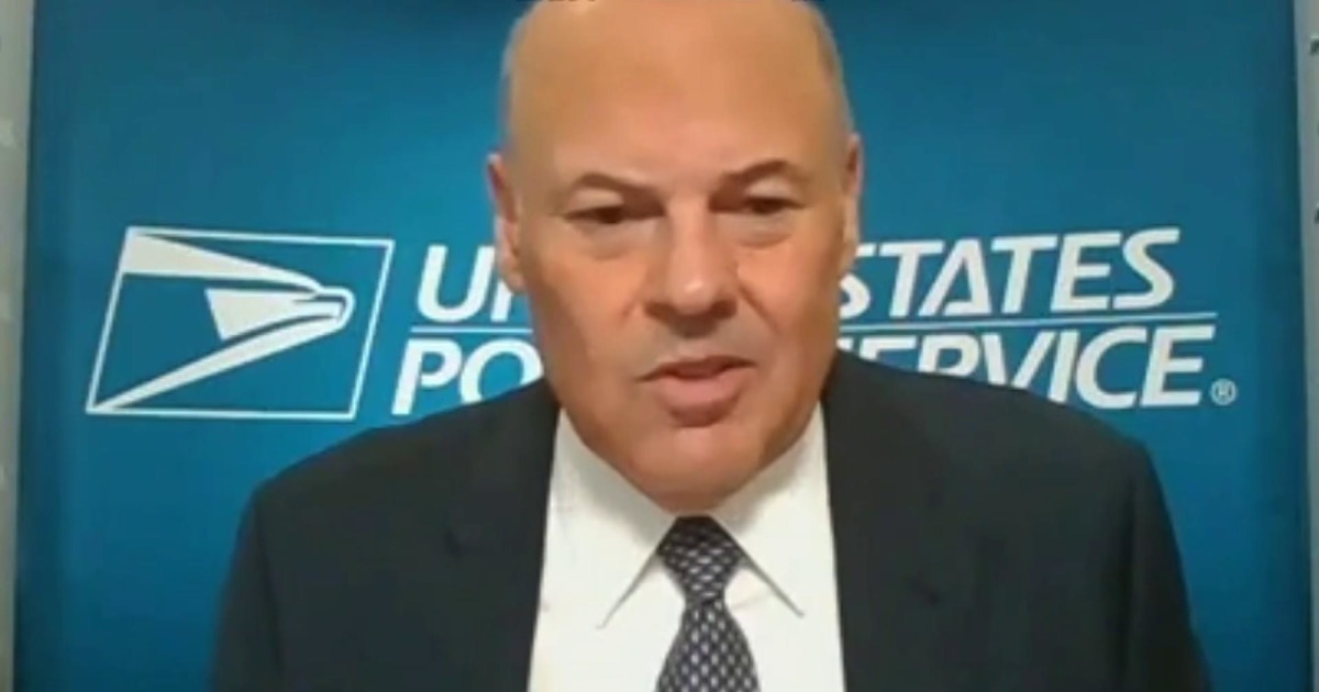 Postmaster general defends USPS changes as states sue to block cutbacks