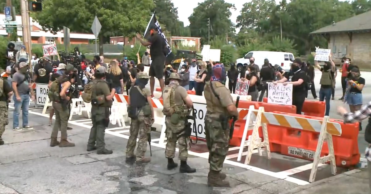 Far-right groups and counter protesters face off near Stone Mountain ...