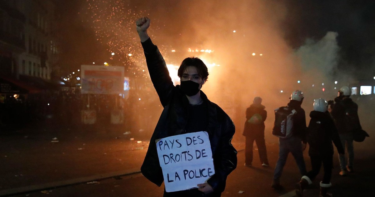 Paris police clash with protesters in demonstrations over new security law