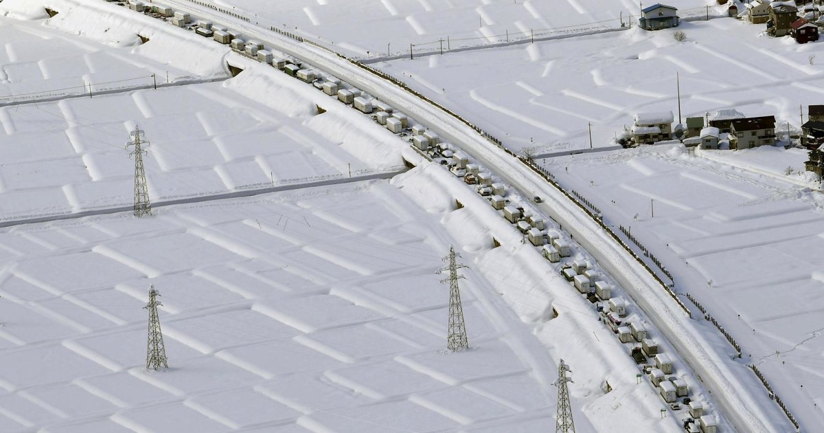 Heavy snow in Japan causes major traffic as crews work to clear roads