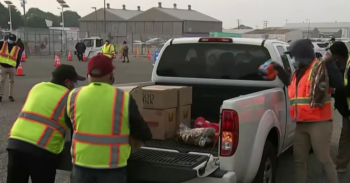Long lines of Americans in need at food banks ahead of Christmas
