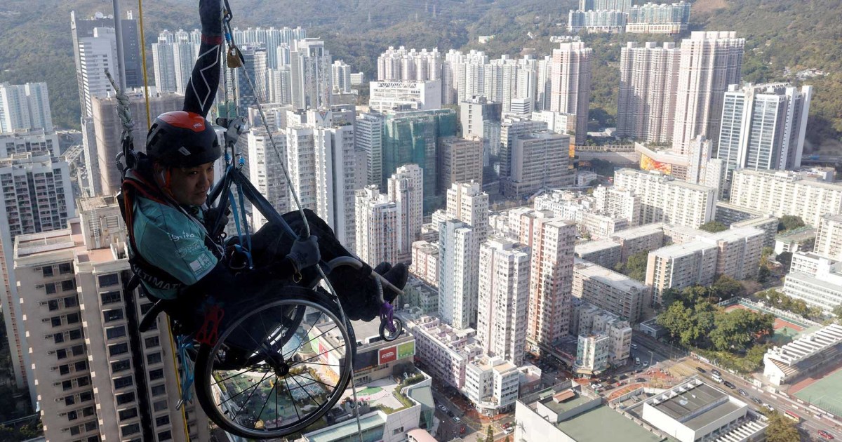 Paraplegic climber raises himself 820 feet outside Hong Kong skyscraper