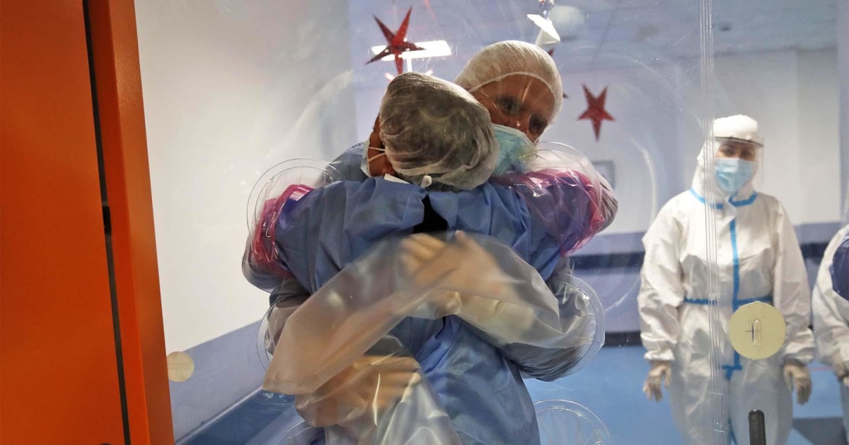 Plastic hug wall brings joy to Italian Covid patients