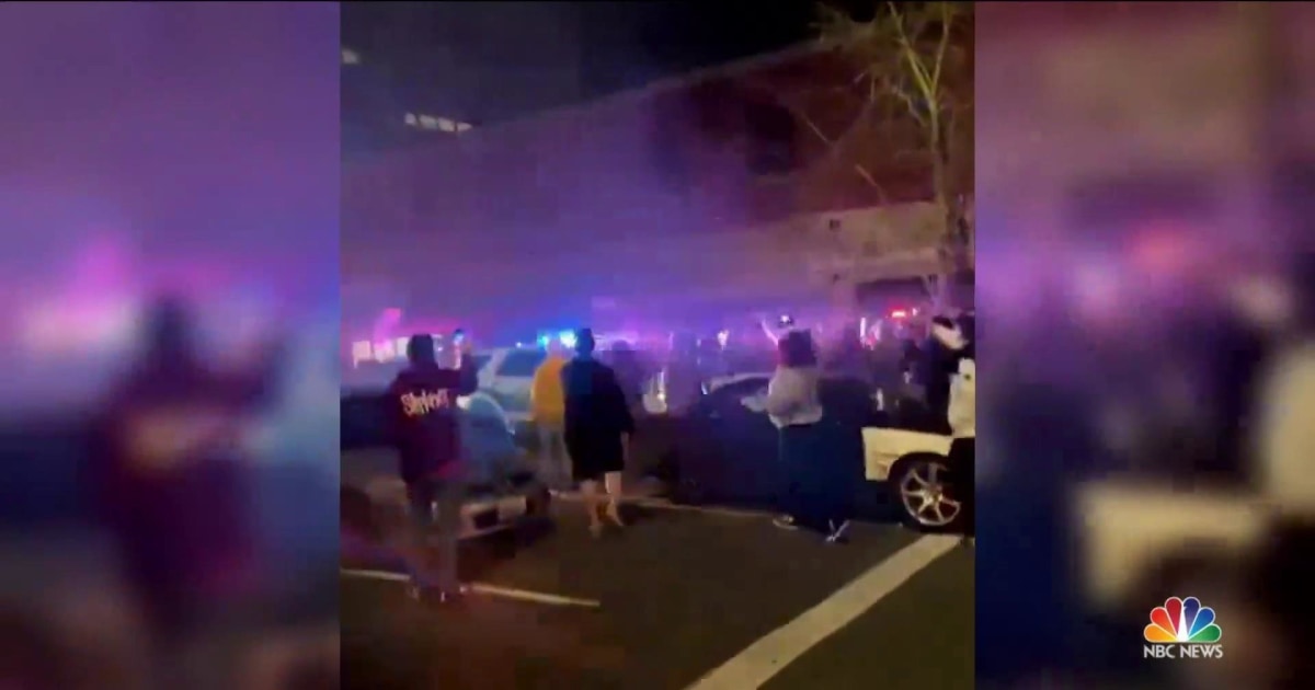 Video appears to show police vehicle driving into crowd of pedestrians ...