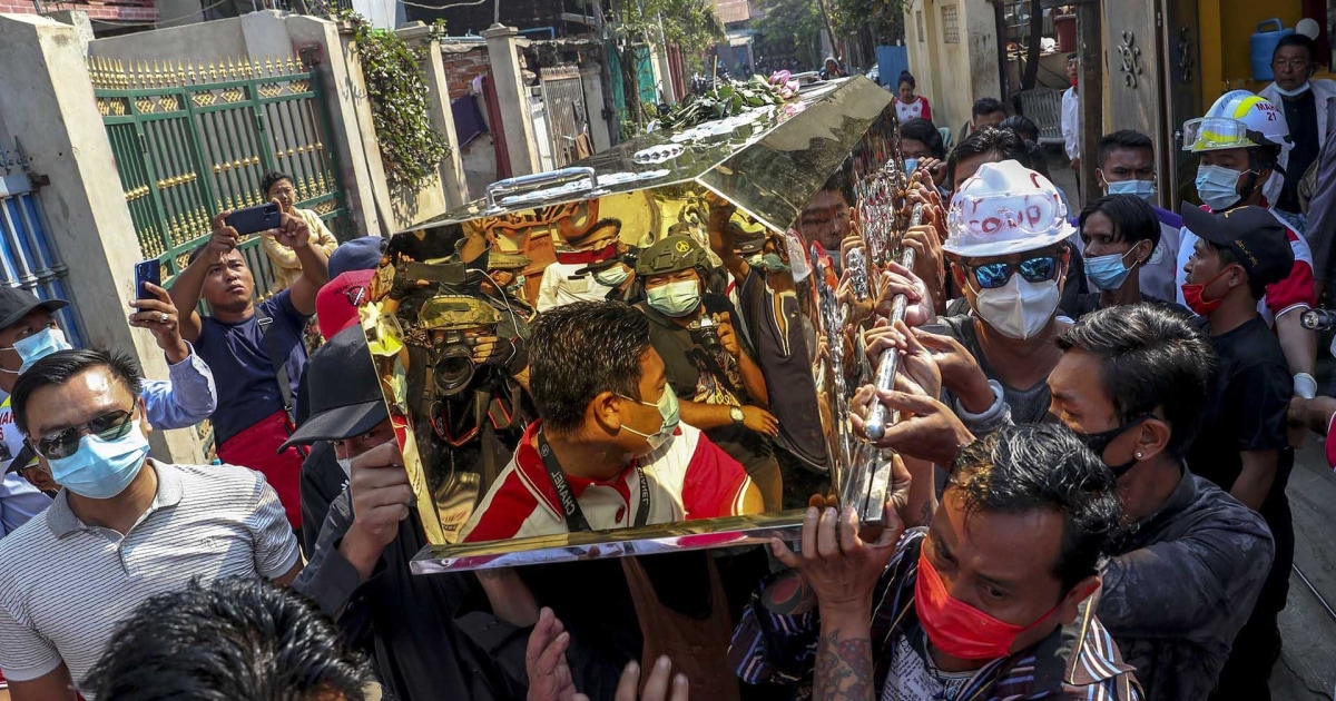 Hundreds of vehicles join funeral convoy for Myanmar protest victim