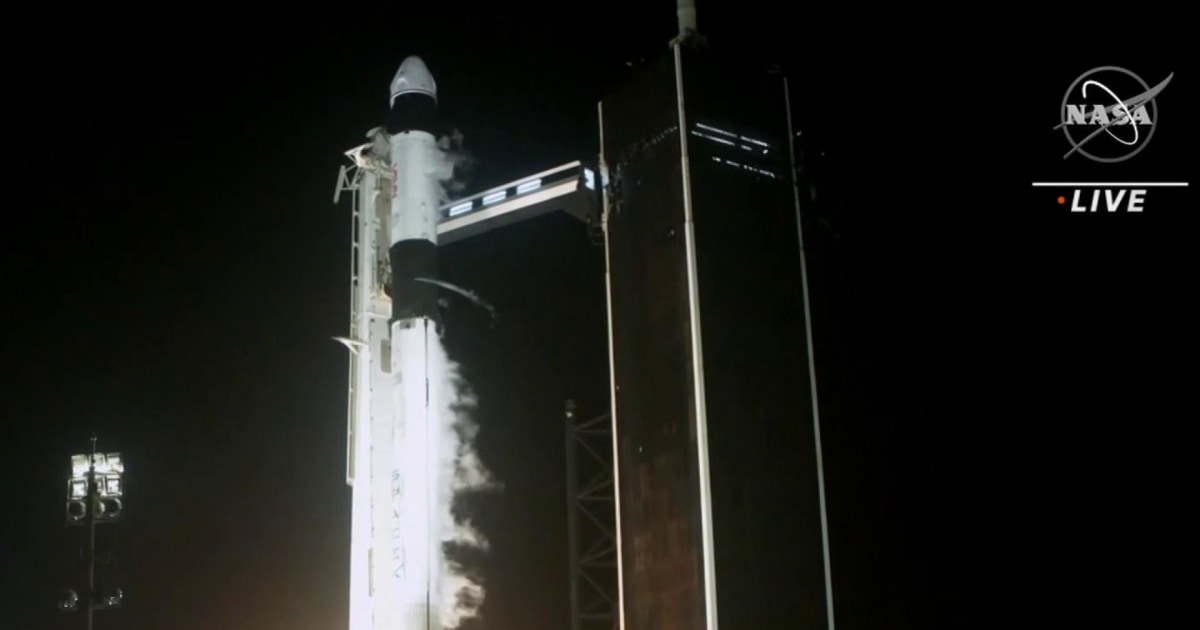 SpaceX launches astronauts to space station on reused rocket