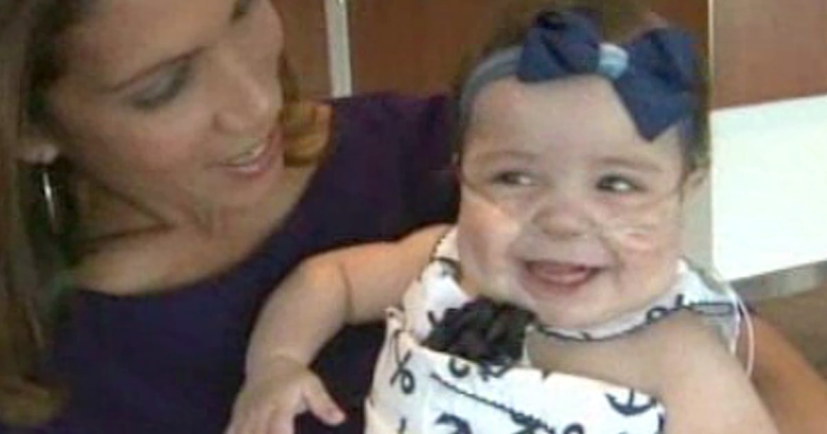 Audrina, born with heart outside body, thrives