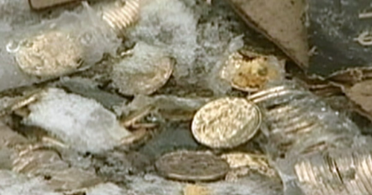 Can you spare a dime? Coins spill onto road