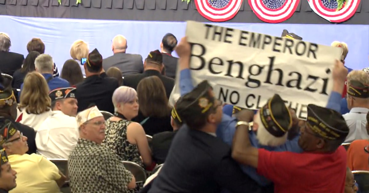 Protester Has Sign Ripped Away in Strange Scene at Obama Speech