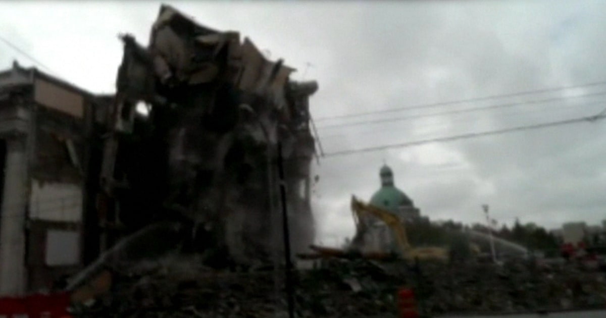 Building collapses on excavator mid-demolition