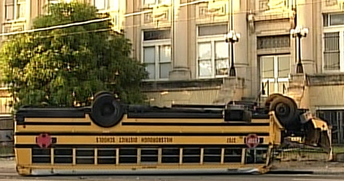 School bus lands upside down after crash
