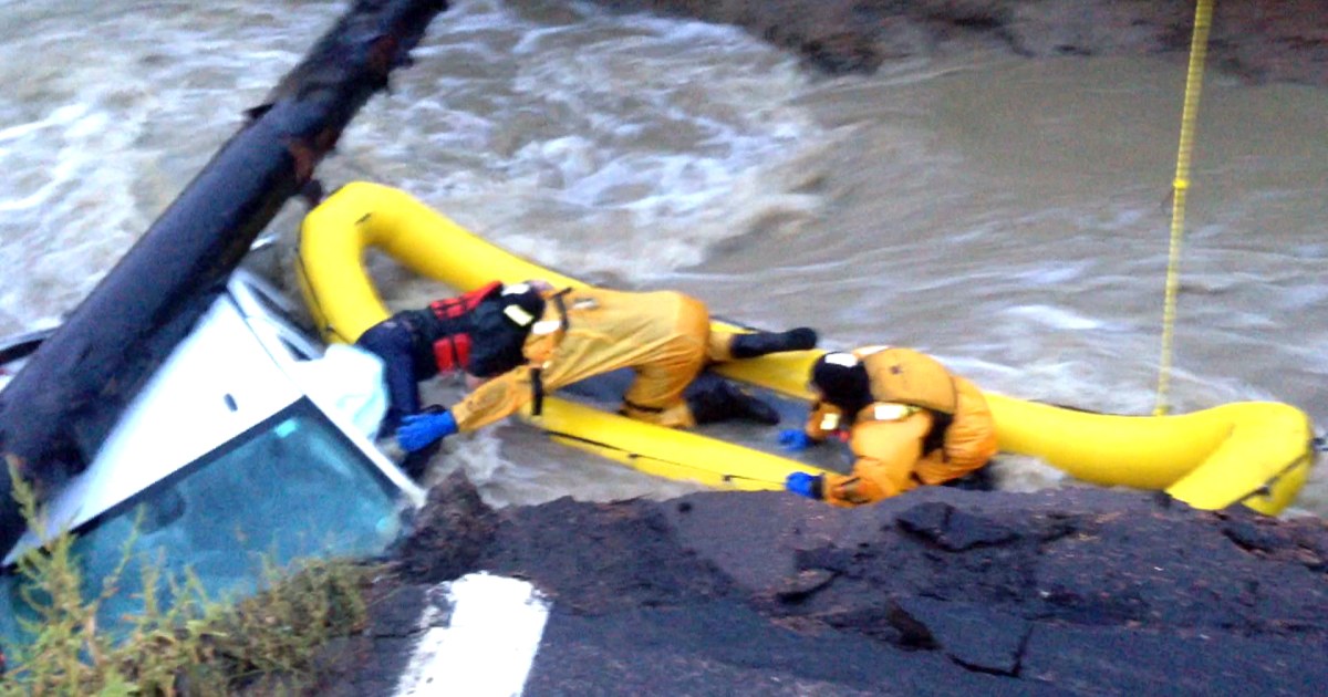 Man pulled from flood waters in dramatic rescue