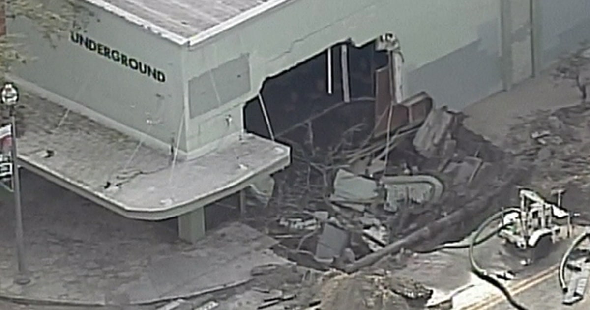 Sinkhole Opens Up Under Florida Sidewalk