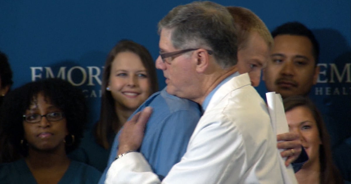 Dr. Brantly, Emory Team Hug It Out After Beating Ebola