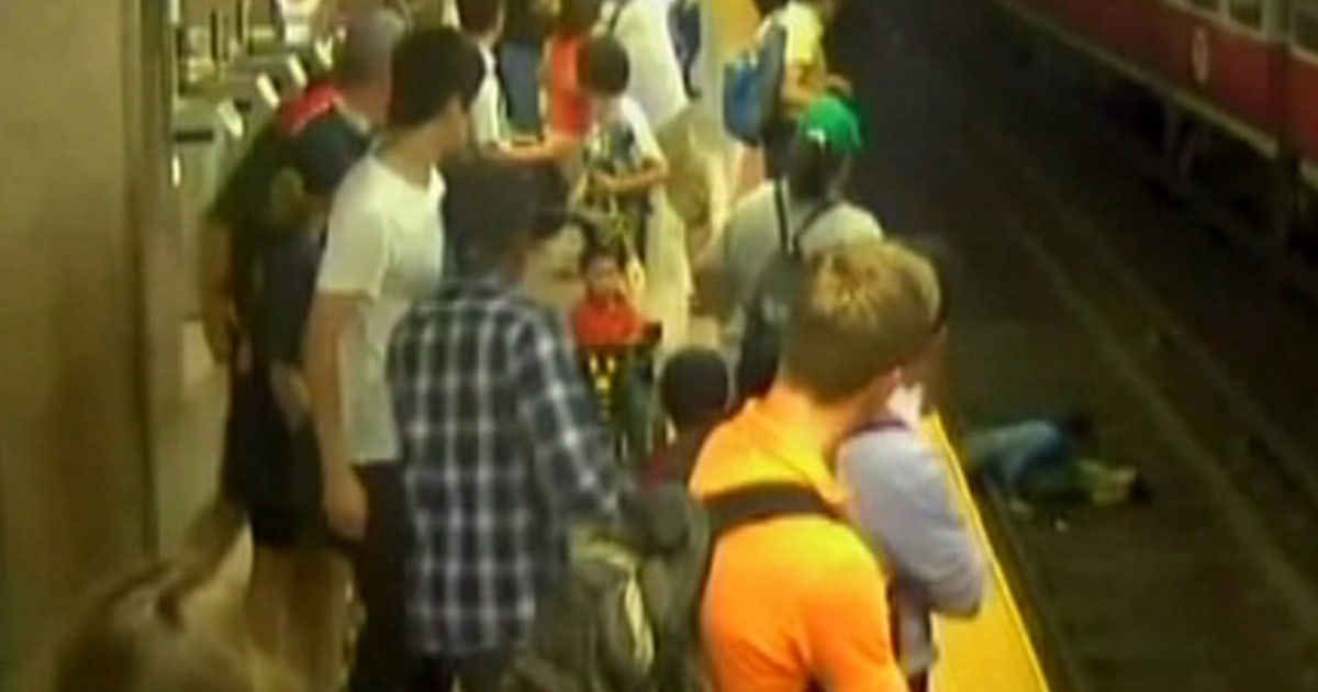 Woman, child fall off train platform