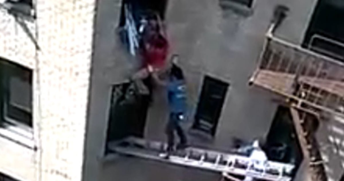 Building worker scales ladder to save man from ferocious fire