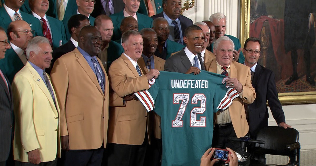 President Obama honors football’s last undefeated team