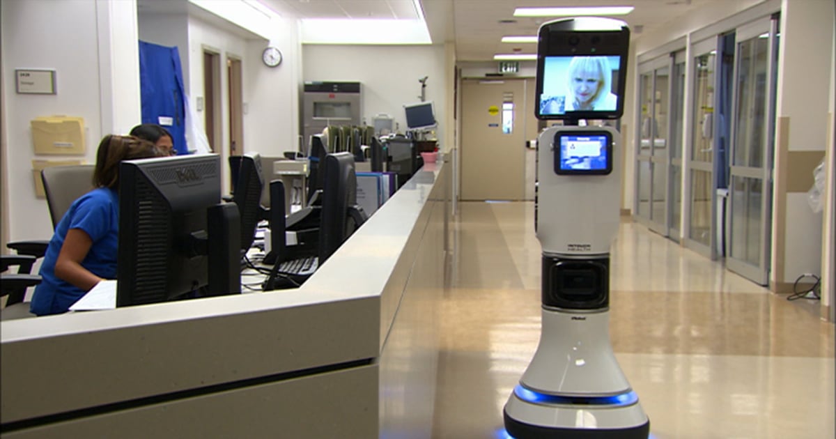 Robots beam doctors into the ER