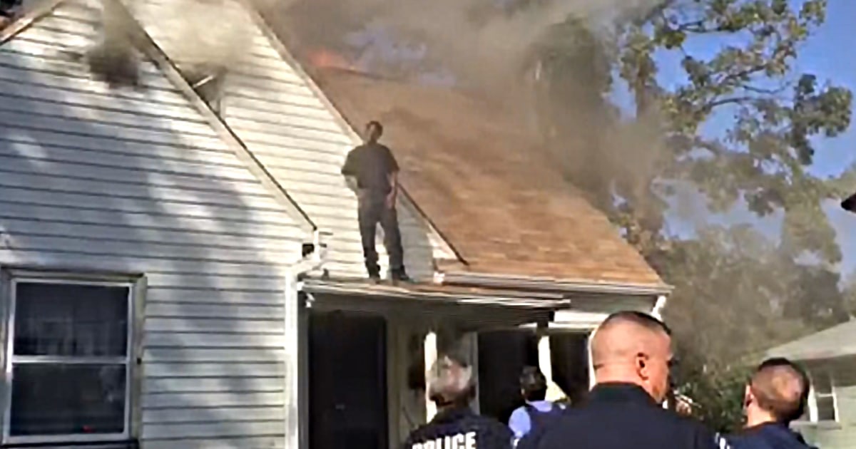 Bizarre Scenes as SWAT Team in Standoff With Man on Burning House