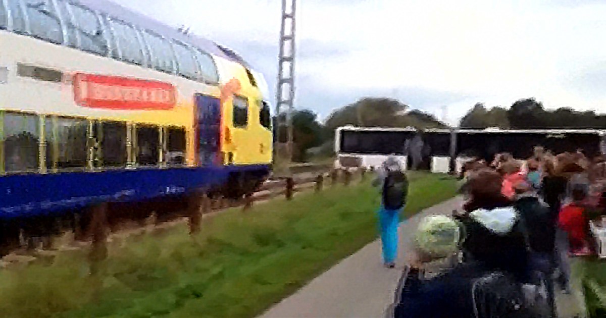 Train Crashes Into School Bus Stuck at Crossing