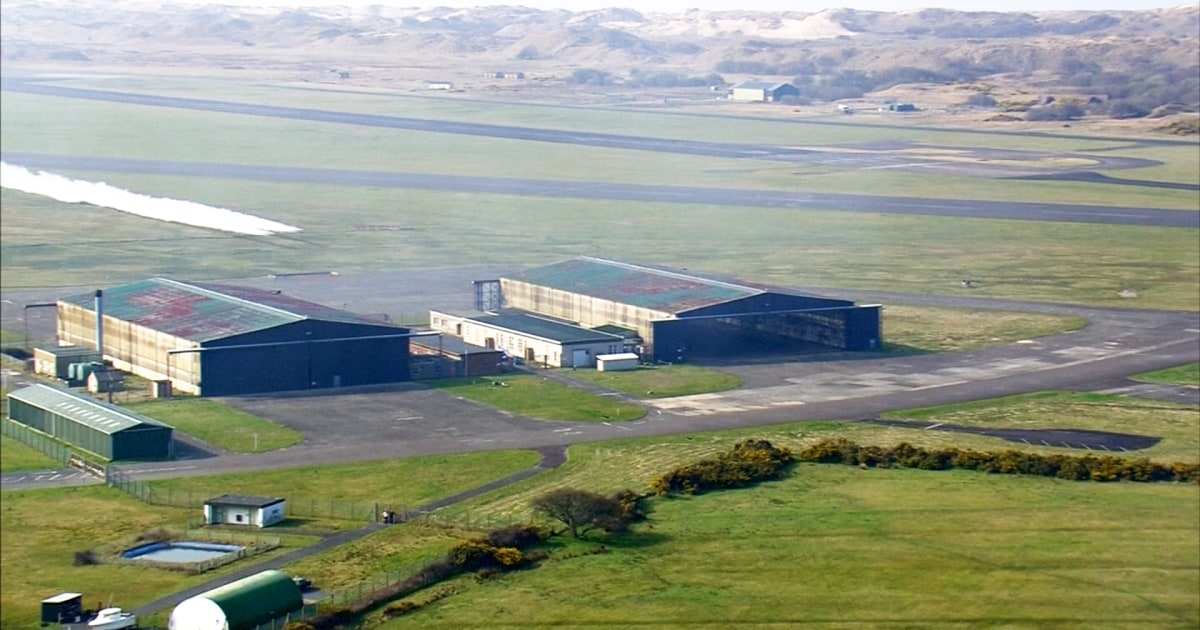 World First: Pilots Fly Through Building at 185MPH