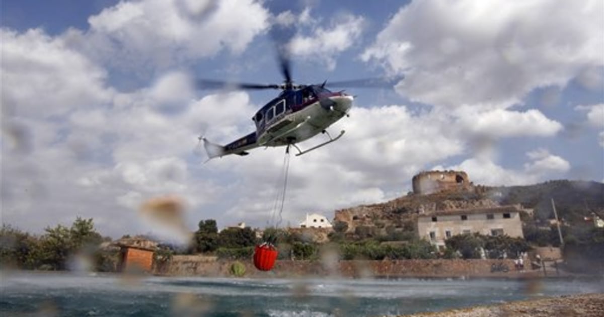 Wildfire forces evacuations near Spain's capital