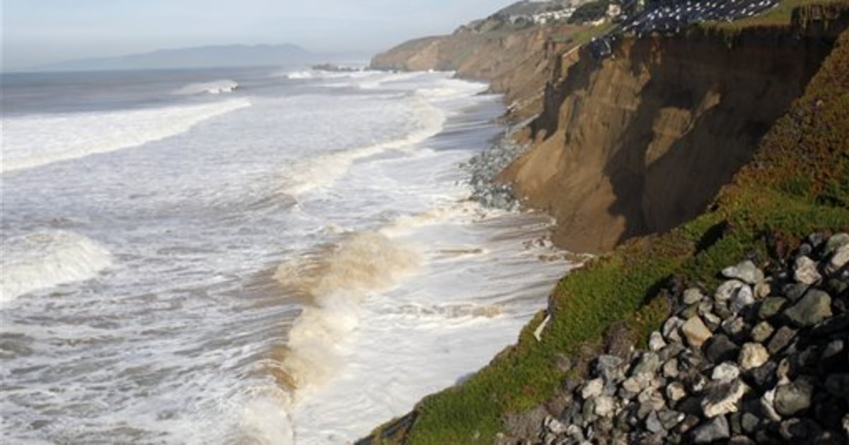 Storm-hit cliff crumbles, forcing evacuations