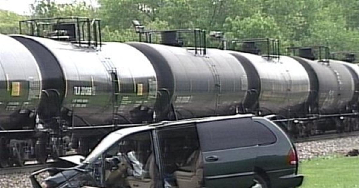 2 hurt saving mom, boy as train hits stalled van