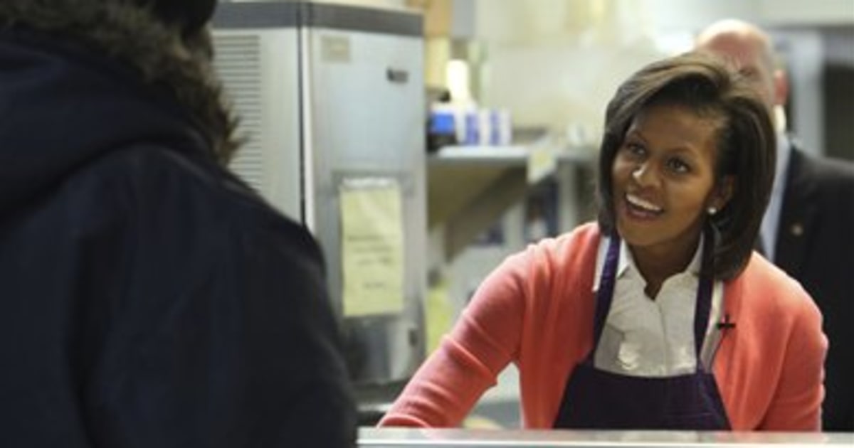 Michelle Obama serves lunch at soup kitchen