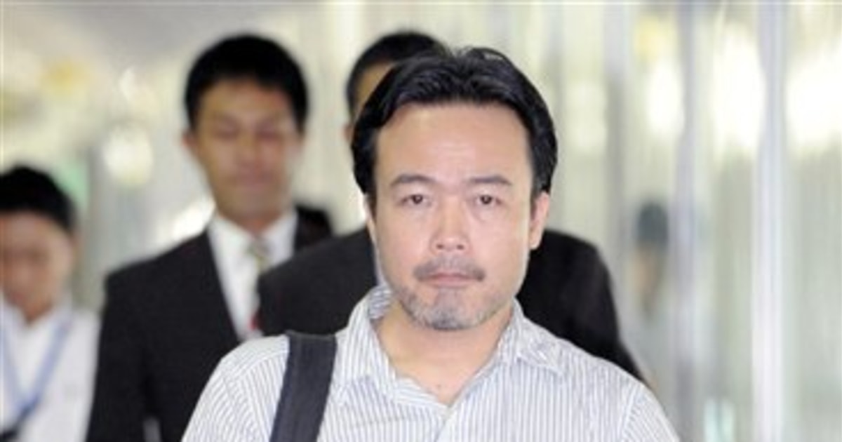 Abducted Japanese reporter returns home