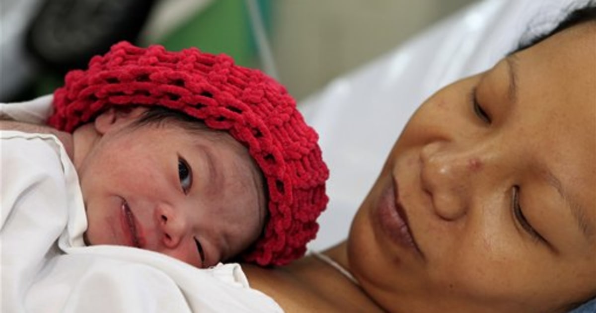 A child is born and world population hits 7 billion